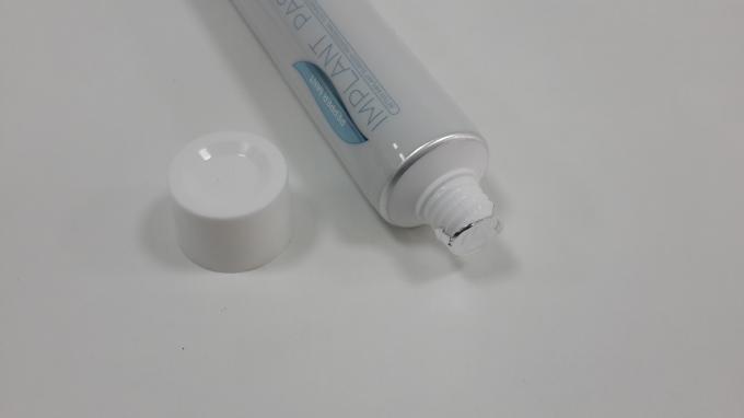 Soft touch material Dental care toothpaste Containers with Fez cap , 100G